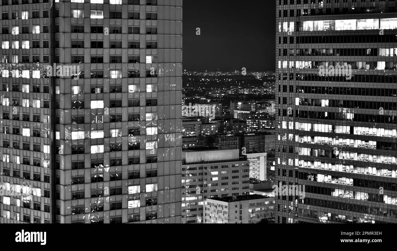 View of at night glass buildings and modern business skyscrapers,. View ...