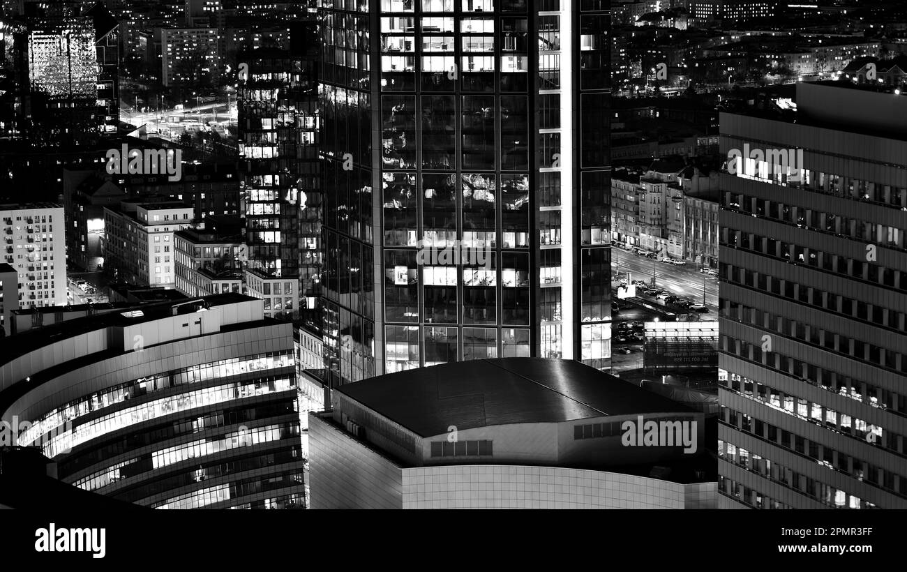 View of at night glass buildings and modern business skyscrapers,. View ...