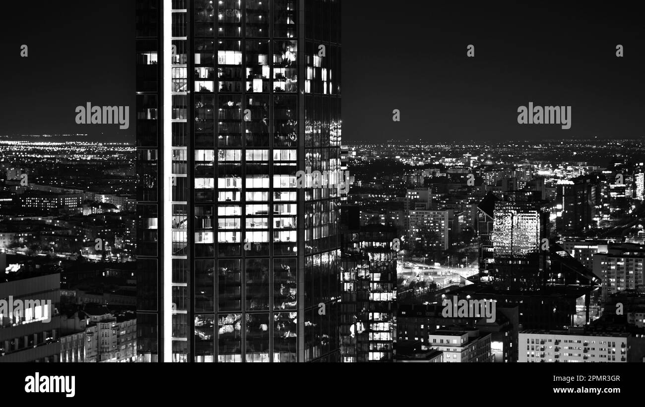 View of at night glass buildings and modern business skyscrapers,. View ...