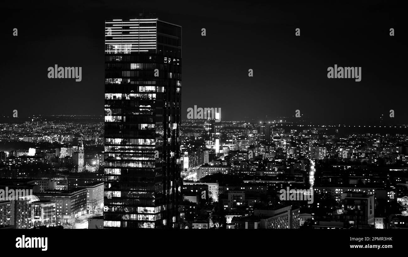 View of at night glass buildings and modern business skyscrapers,. View ...