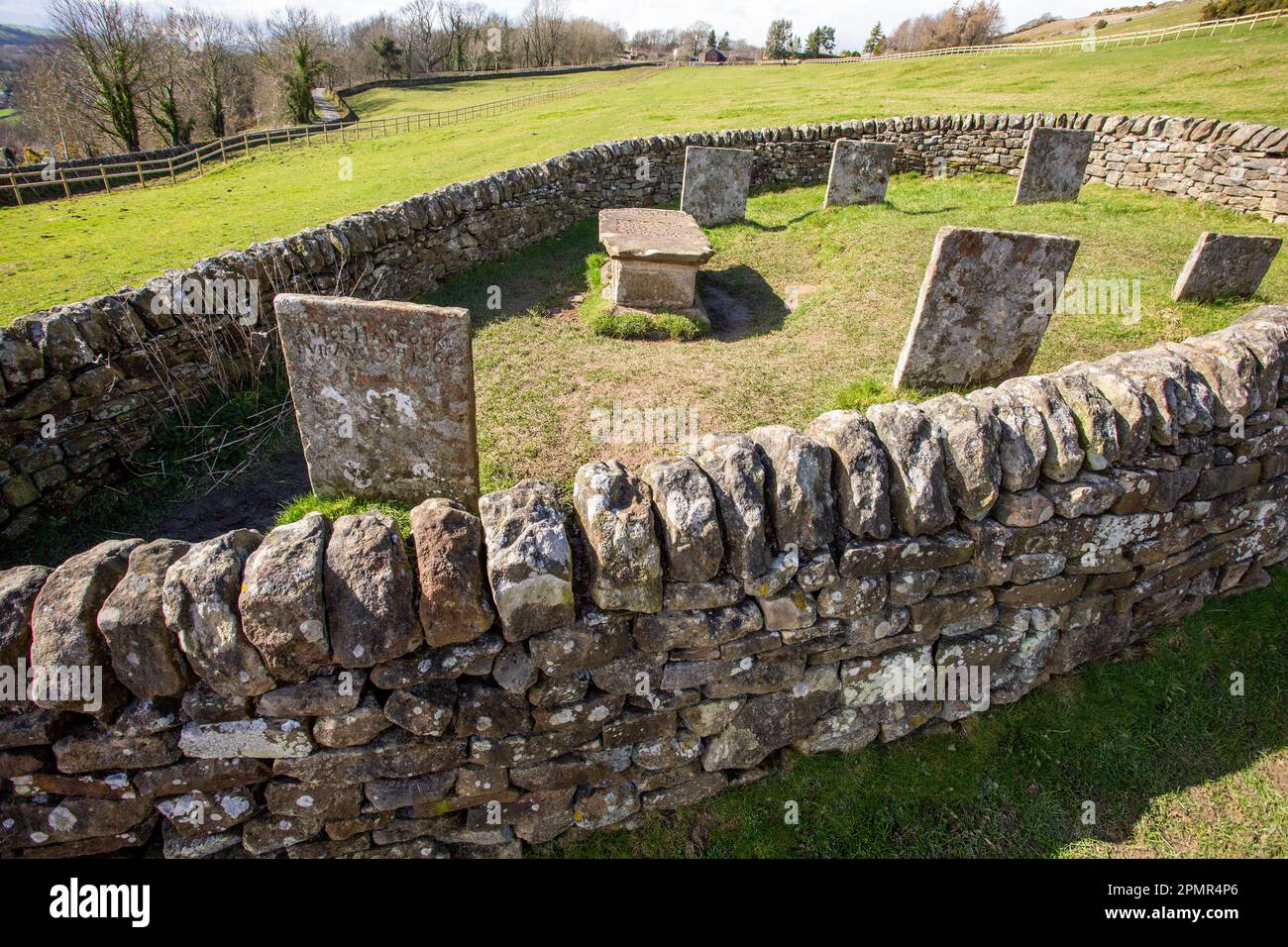 The Riley graves and tomb enclosed by a stone wall, the graves of the ...