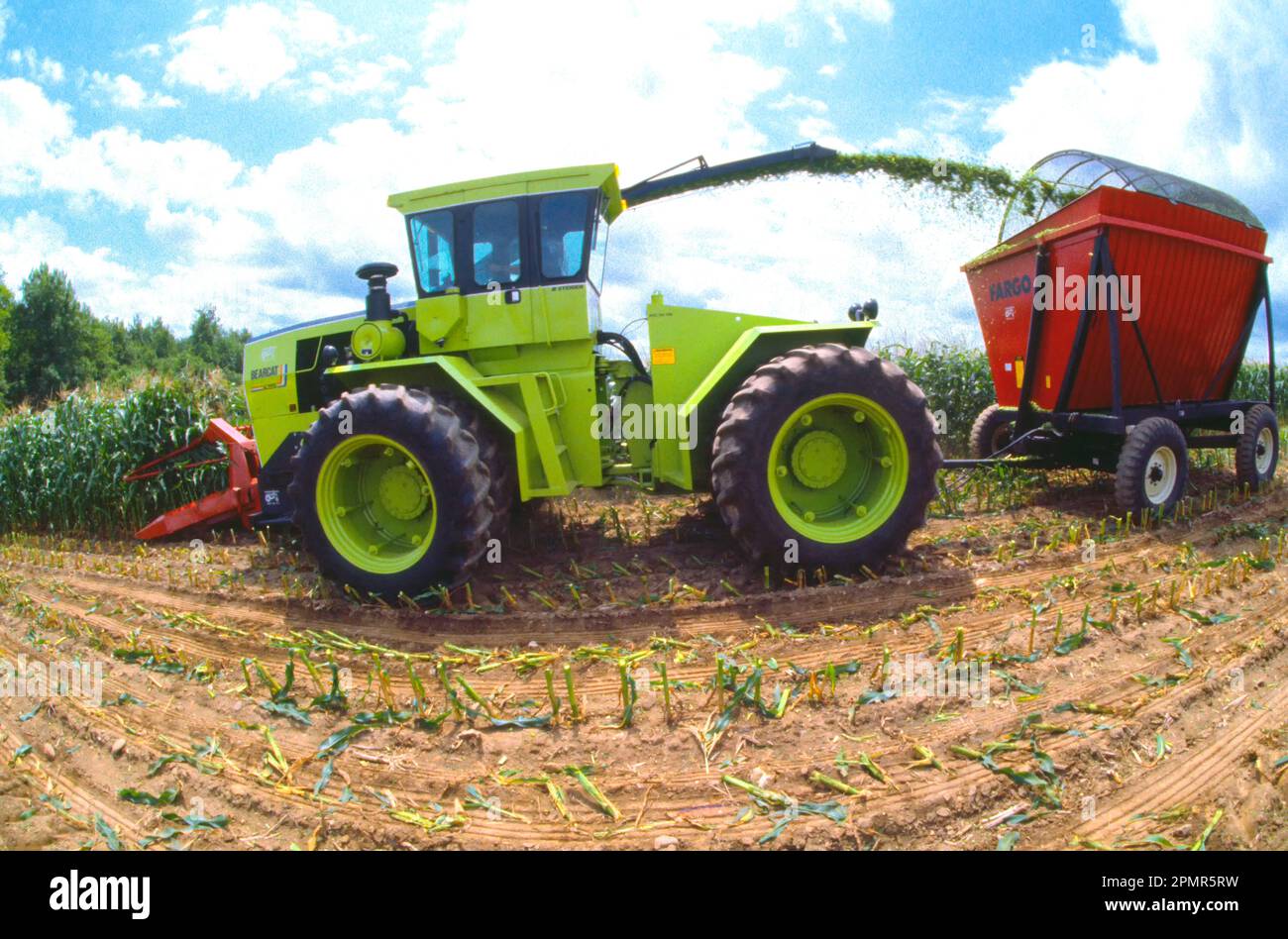 Steiger Bearcat Tractor Towing Fargo Forage Wagon. Harvesting Corn ...