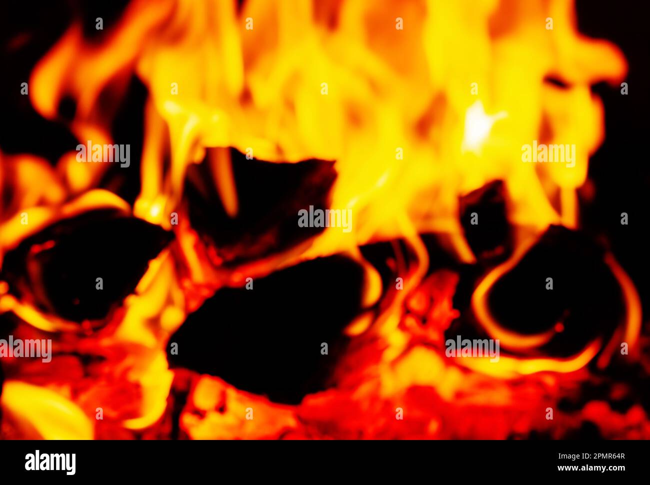 Fire Background. Burning wood and glowing embers. Blurred focus Stock ...