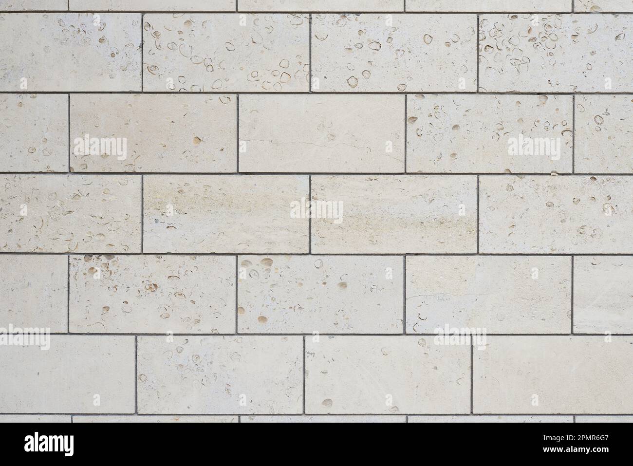 Natural limestone wall with coquina texture Stock Photo - Alamy