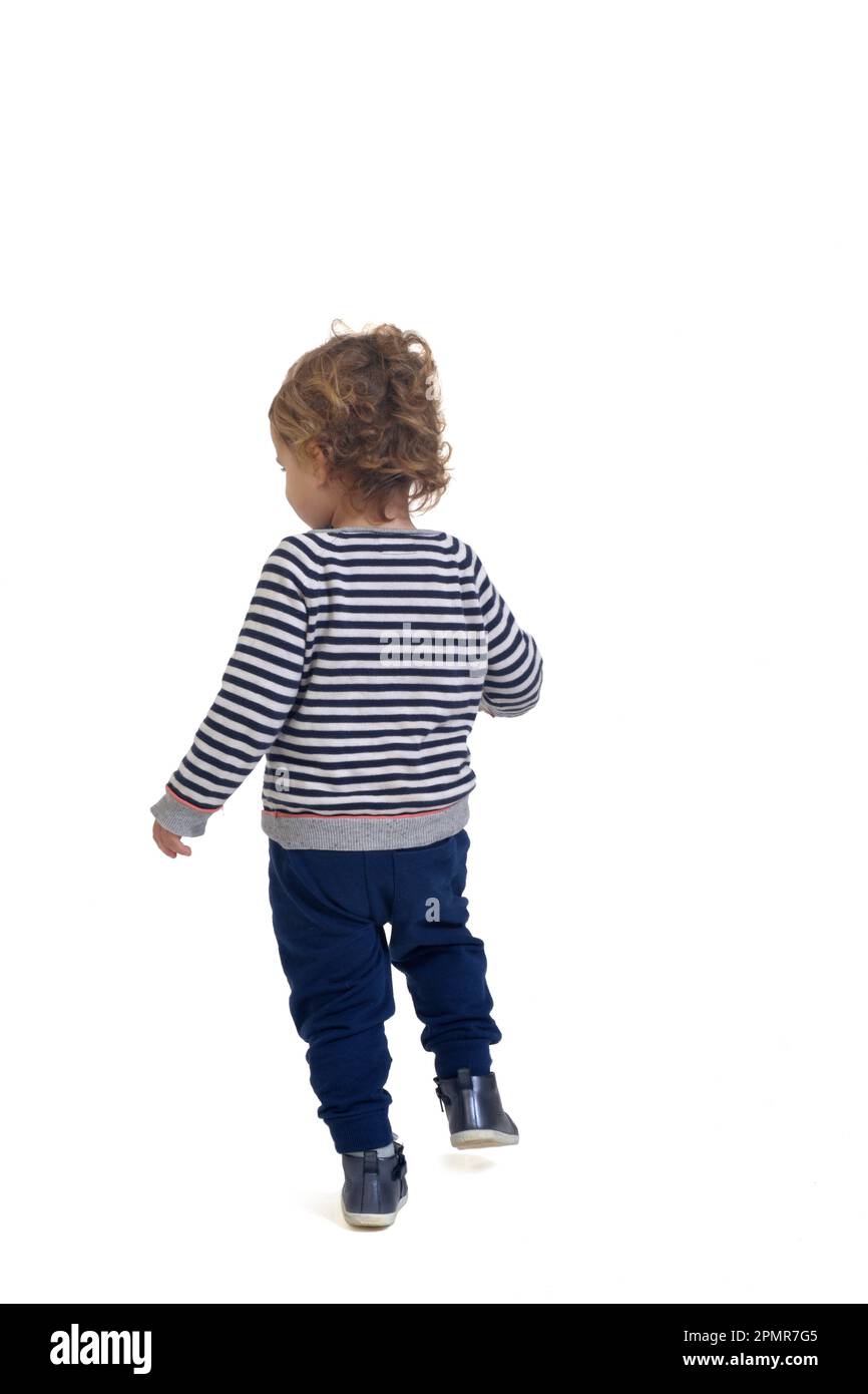 back view of a baby boy walking on white background Stock Photo - Alamy