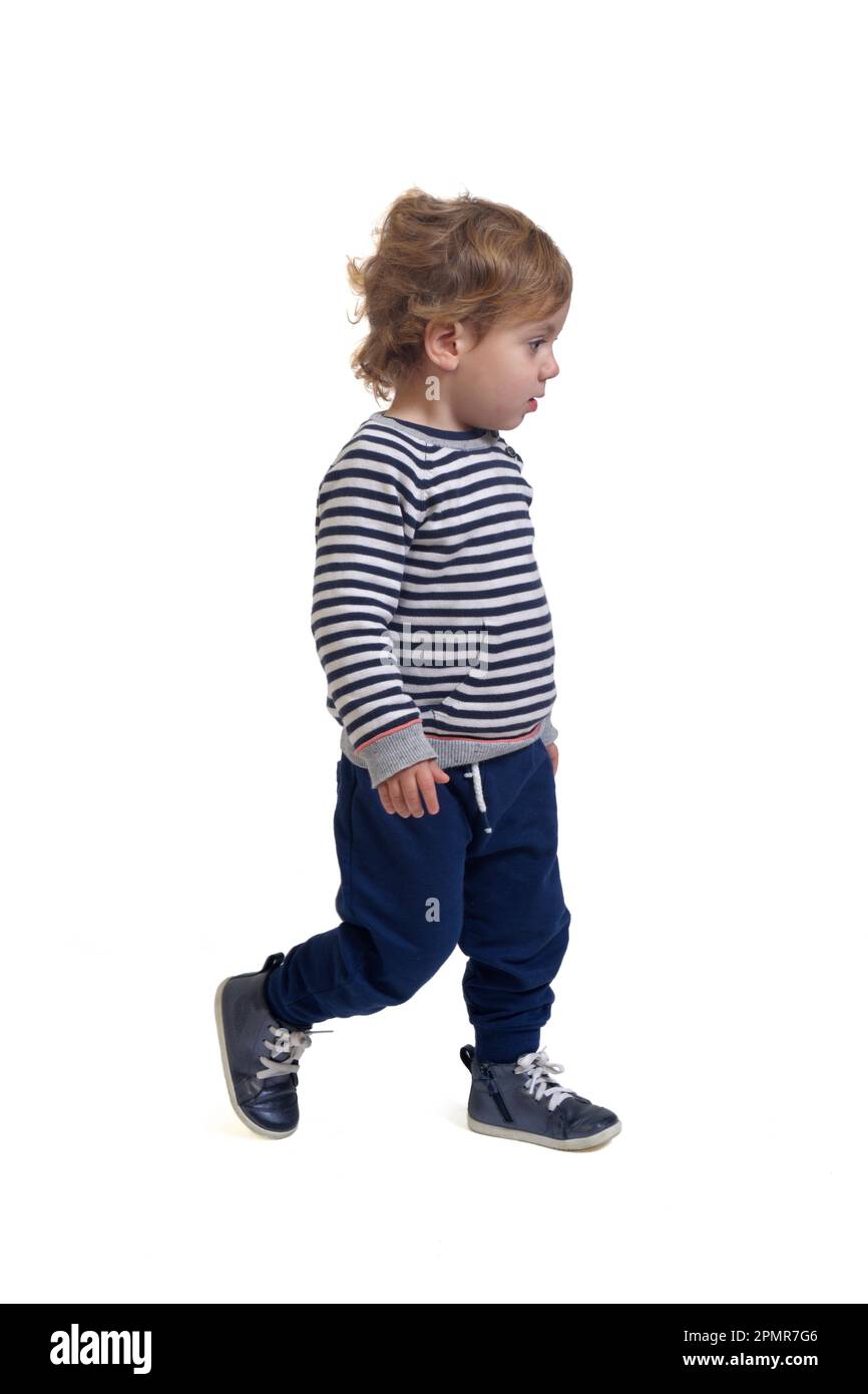 Kids Walking Side View Side View Of Boy Walking With Scowl Face...