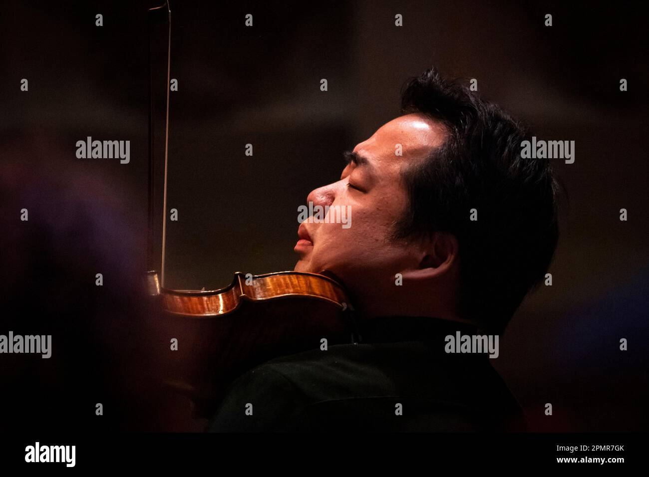 London, Britain. 13th Apr, 2023. Violinist Ning Feng performs during ...