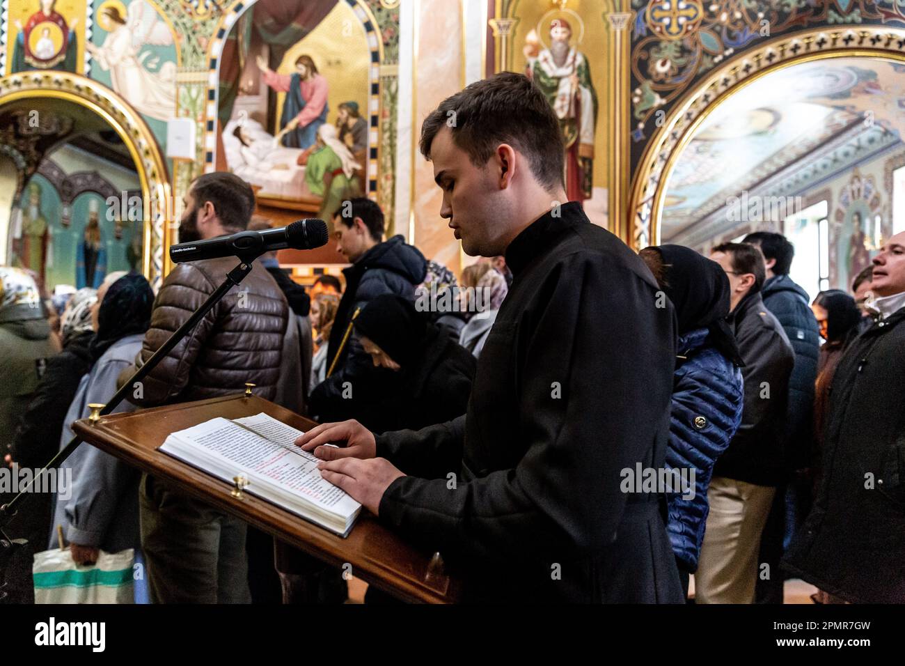 Kyiv, Ukraine. 14th Apr, 2023. A Ukrainian priest reads the Bible ...