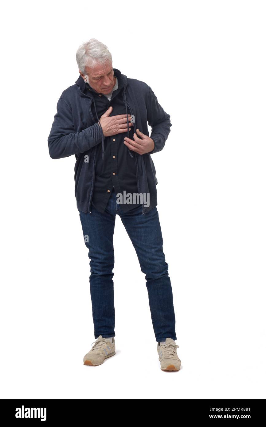 full length portrait of a man in chest pain in isolated on white Stock ...