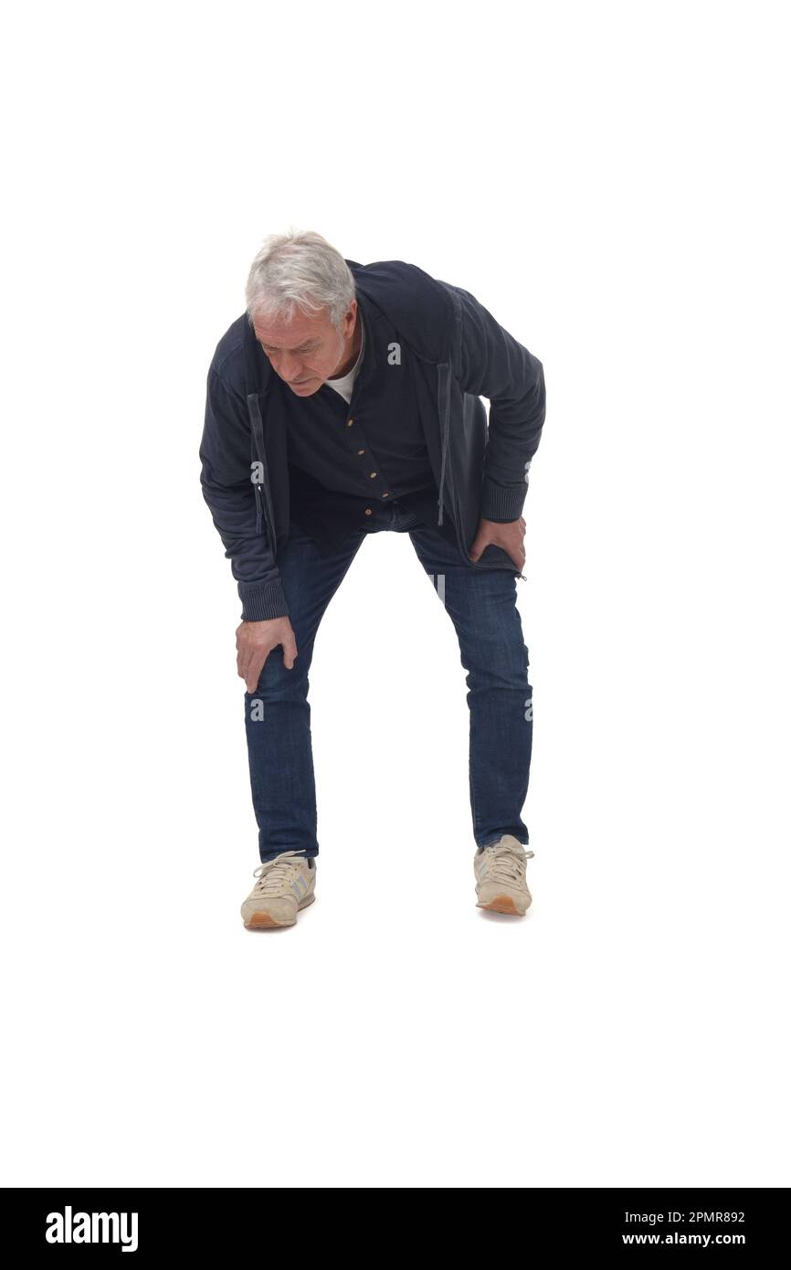 full portrait of front view of a man crouched down and looking the ...