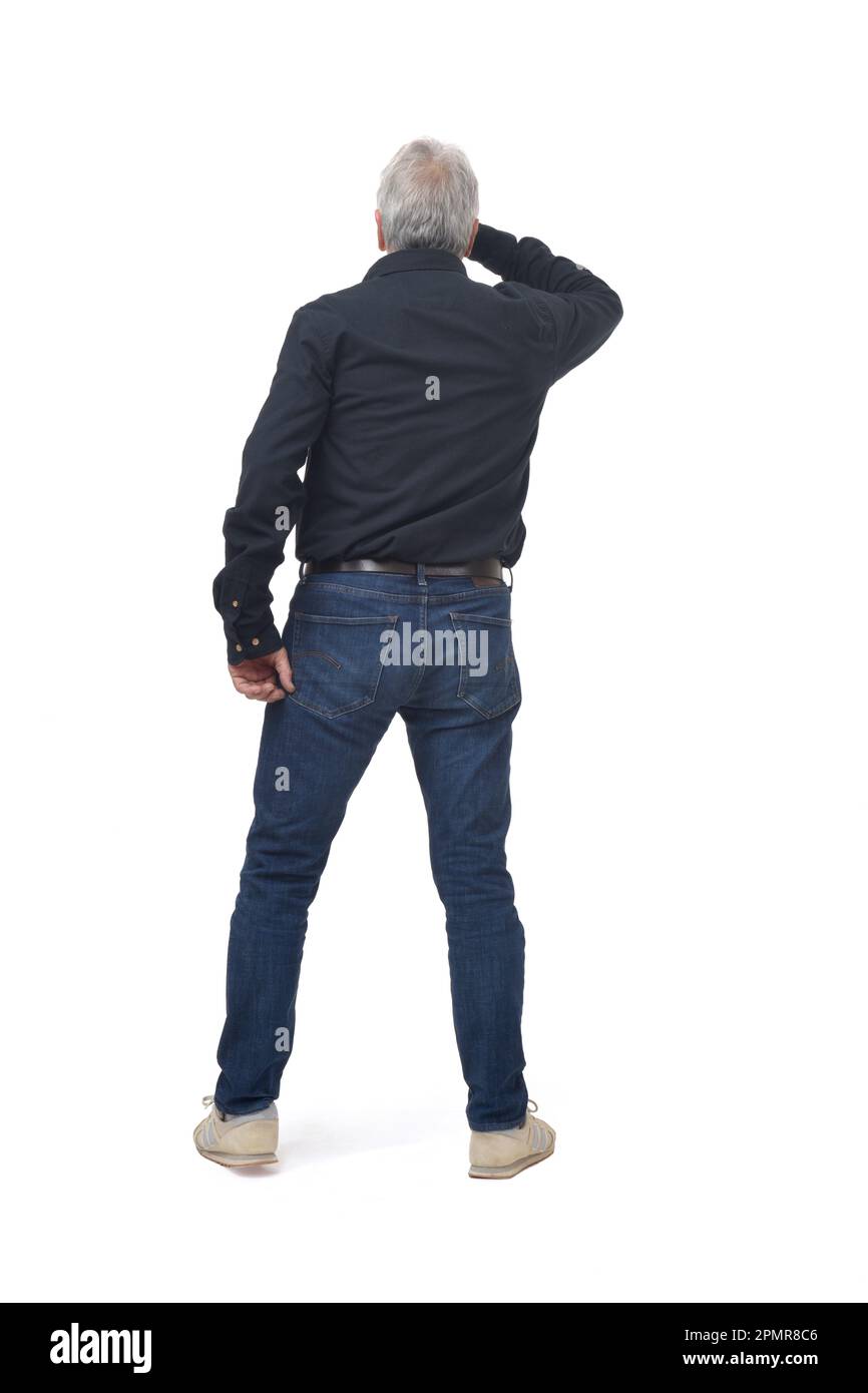 back view of standing man looking away with hand on forehead on white ...