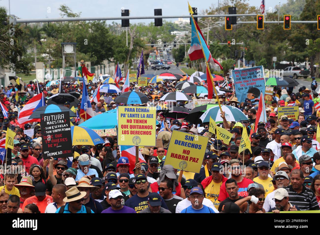 A large group of people marching to protest against the Privatization ...