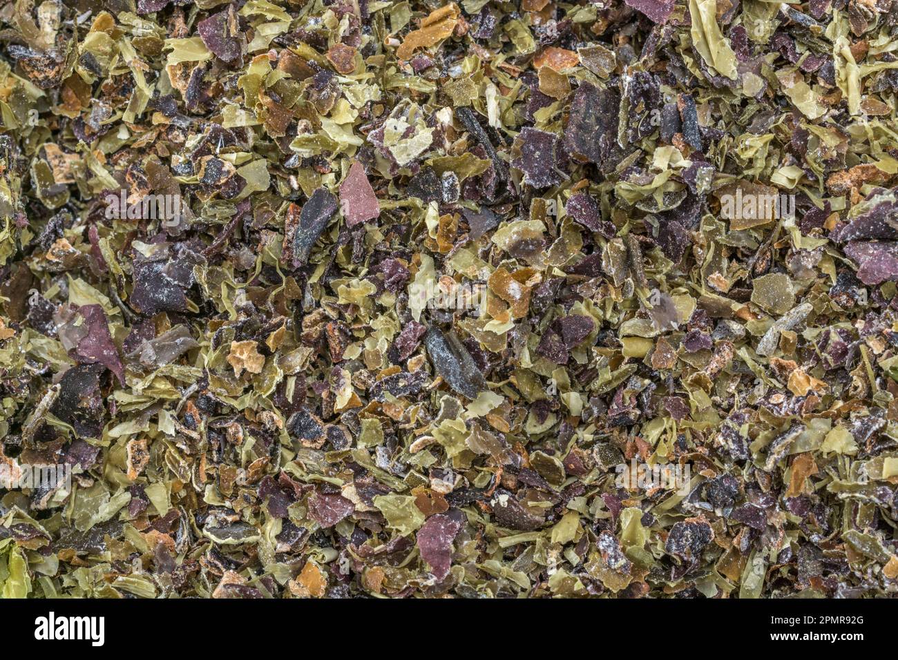 Close-up shot milled flaked dried seaweed - to be used as a savoury ...