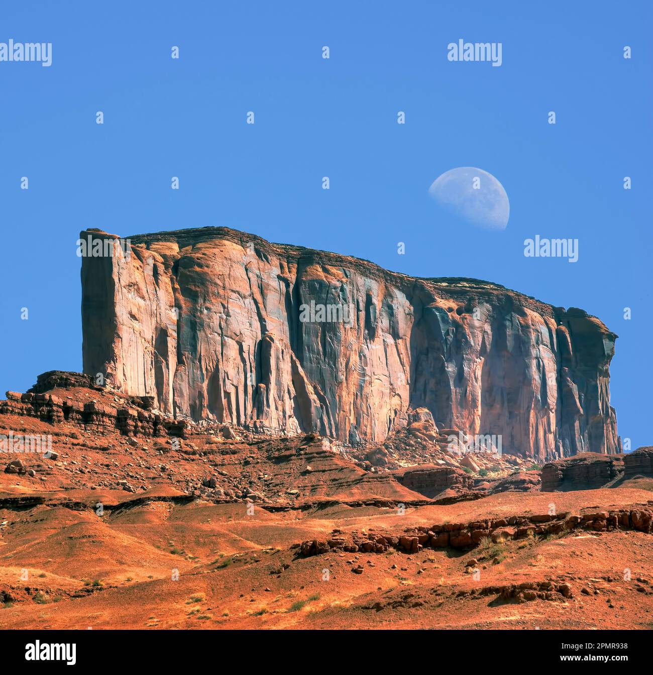 Half Large moon over Monument Valley Arizona Stock Photo - Alamy