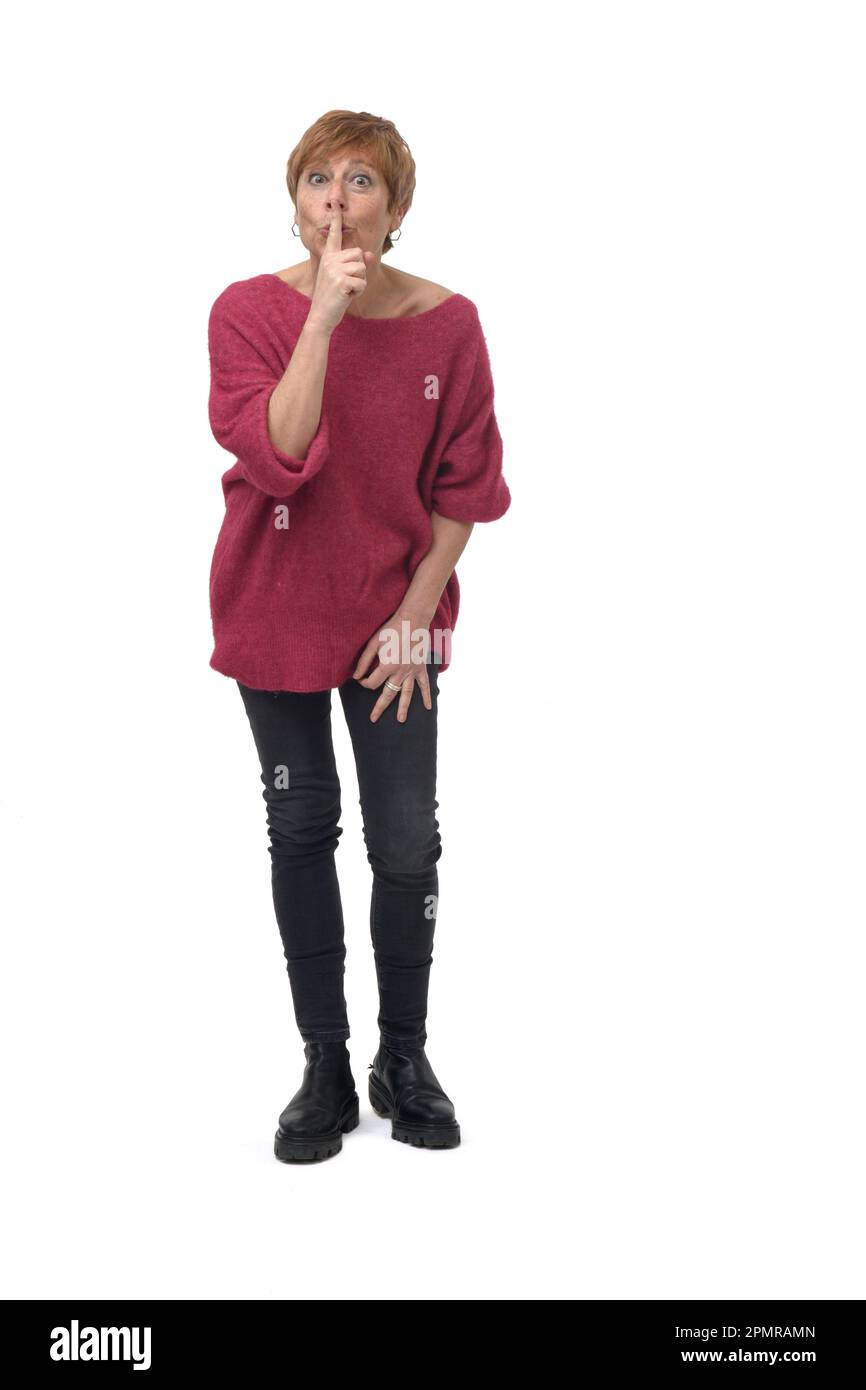 woman showing silence sign on white background Stock Photo - Alamy