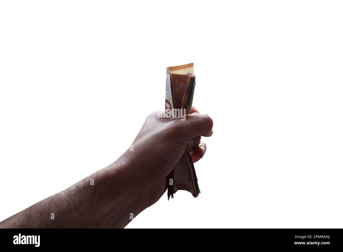 Hand holds some money banknotes, concept of economic wealth and success ...