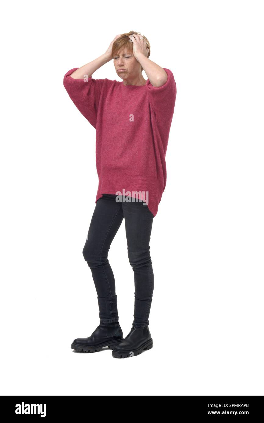 full length portrait of a woman in headache pain in isolated on white ...