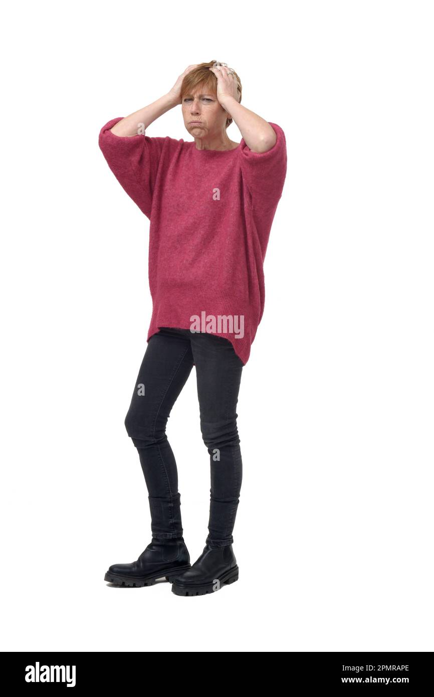 full length portrait of a woman in headache pain looking at camera in ...