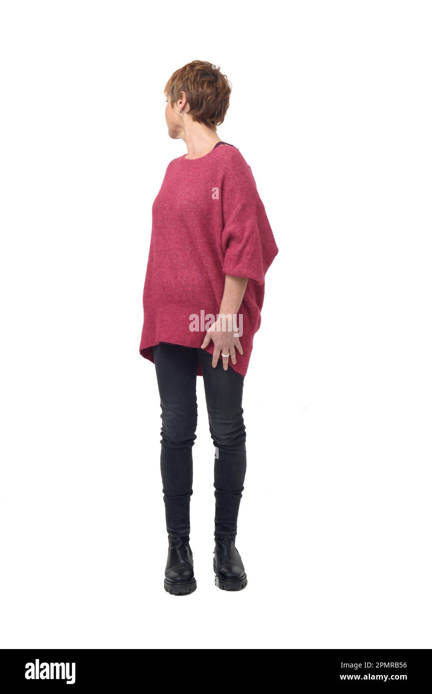 front view of full length portrait of woman standing and turned and ...