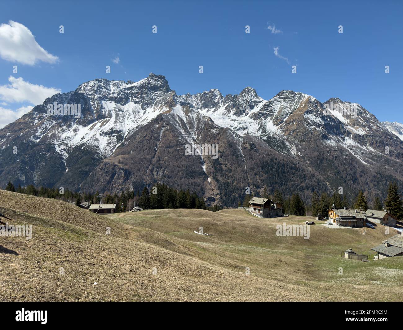 a beautiful view of the mountain path leading to Lake Palu, Valtellina ...