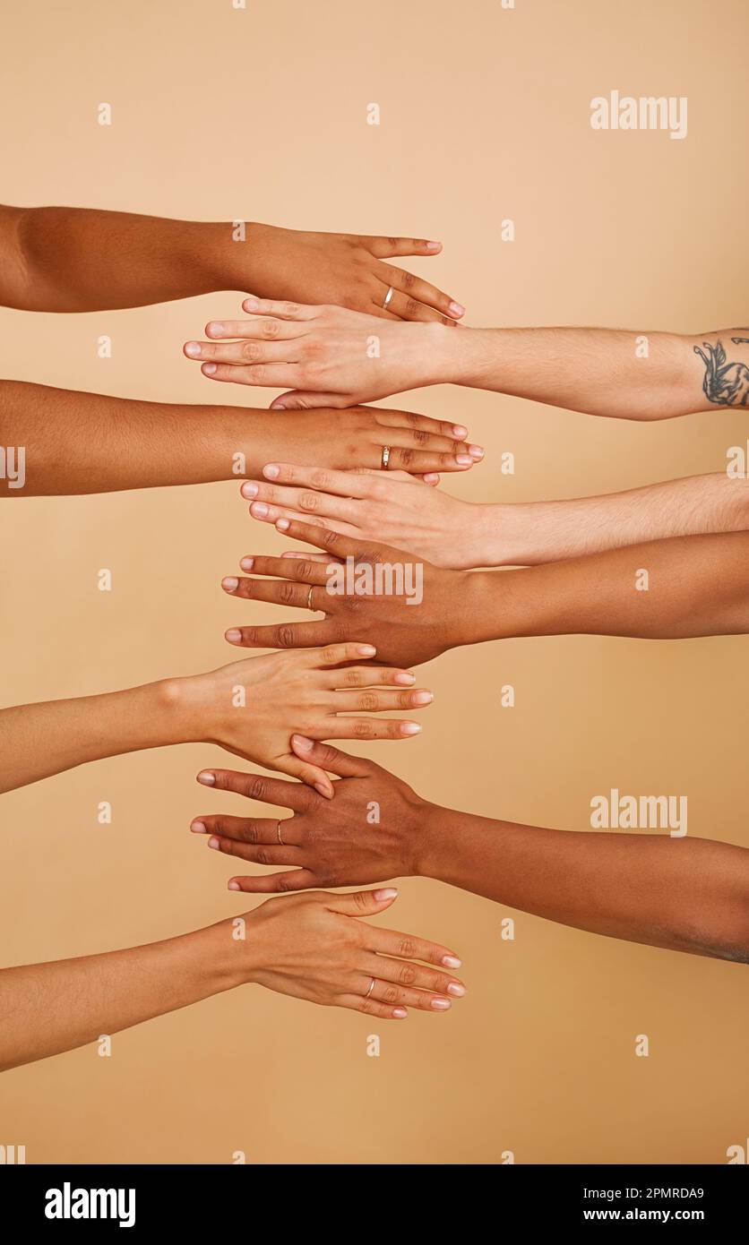 Hands of unrecognizable women with different skin colors Stock Photo ...
