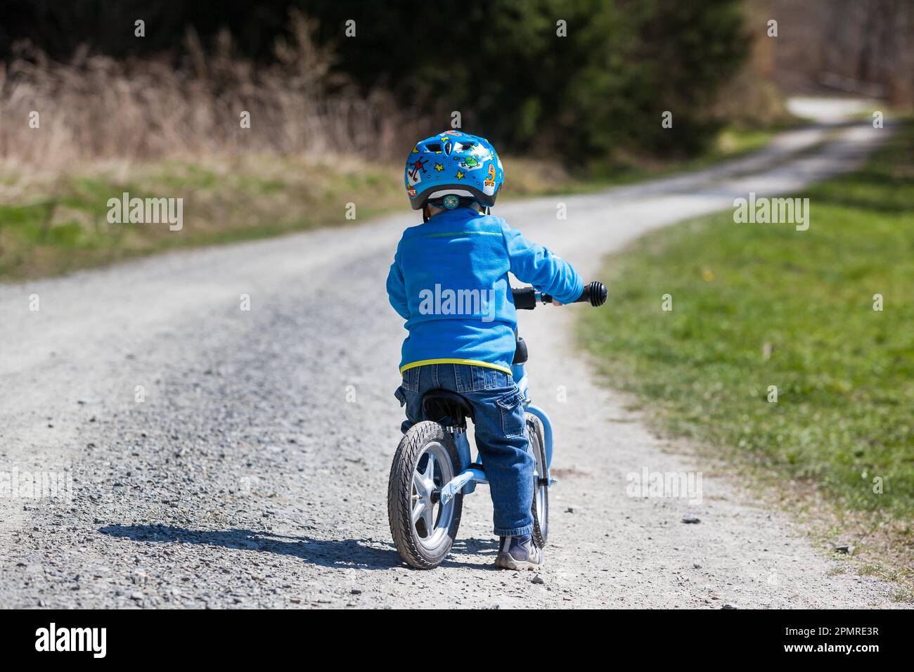 Child with a running bike Stock Photo - Alamy