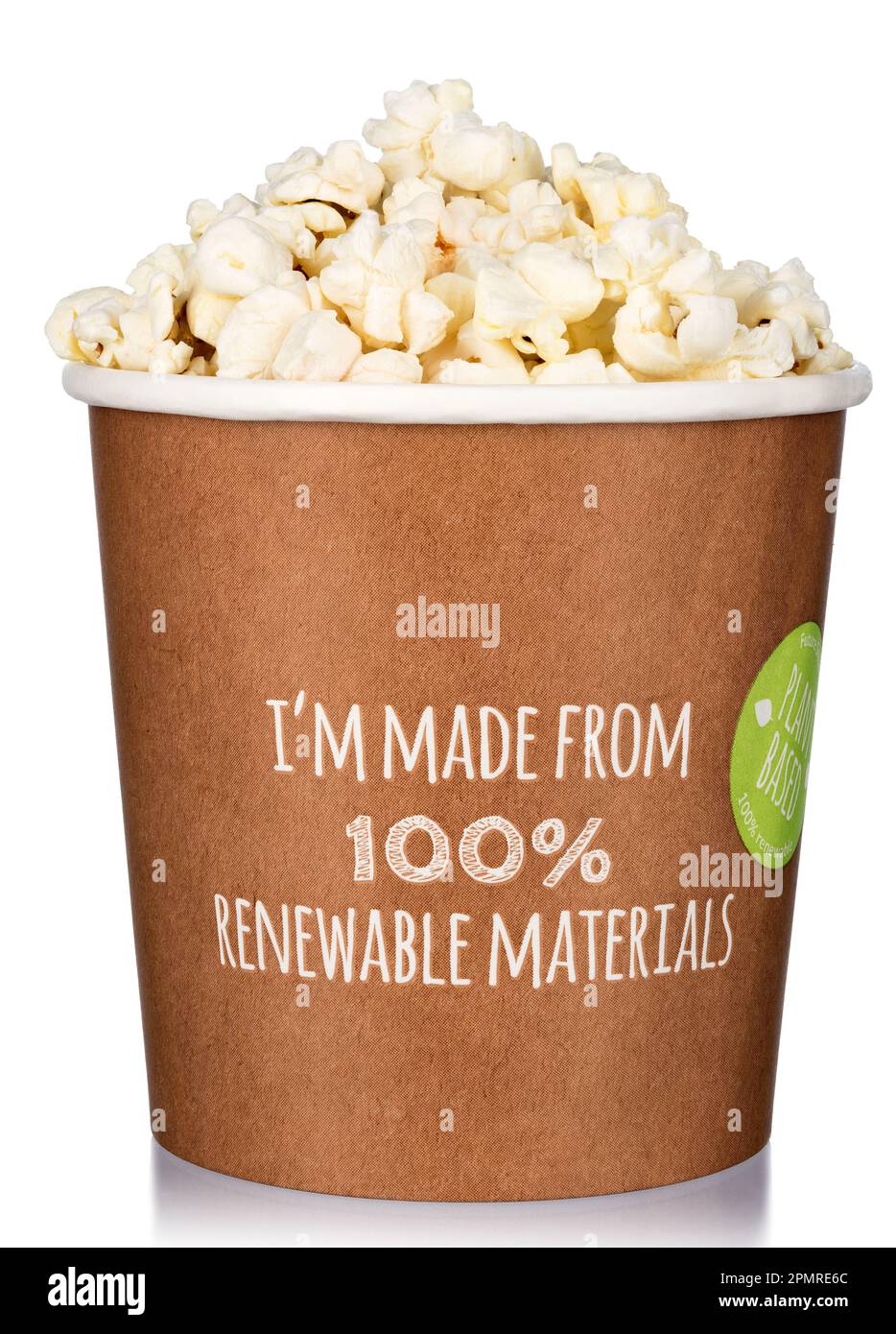 Delicious popcorn in a paper cup, isolated on white background. Full ...