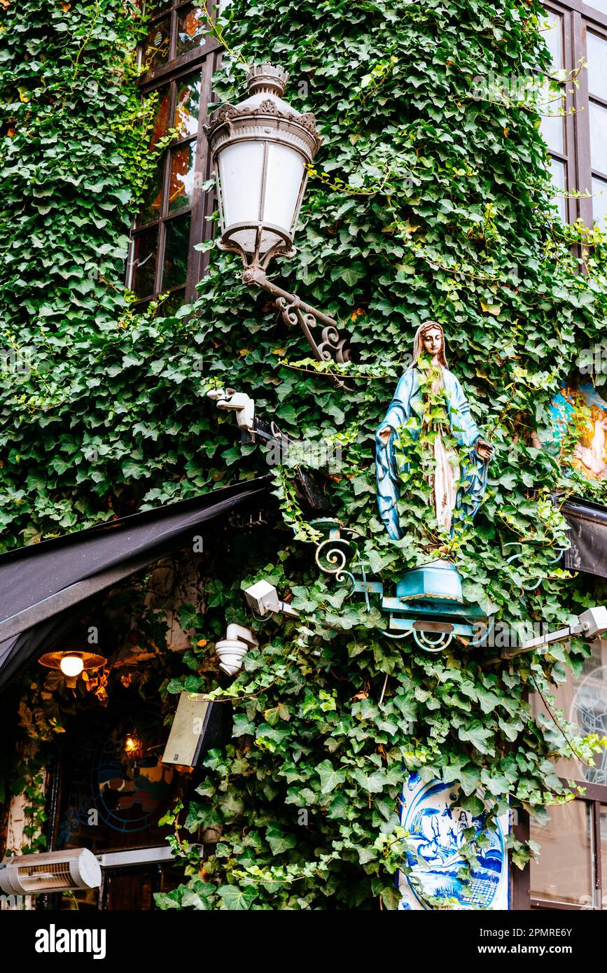 One of the Antwerp Madonnas. Small niches in the corners of the houses ...