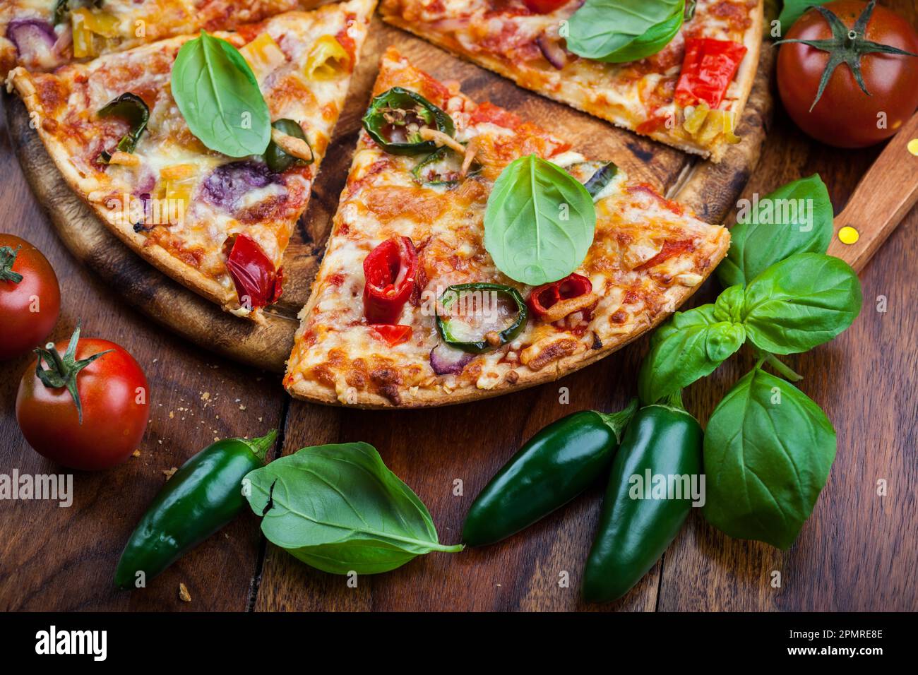 Tradition spanish pizza with chili and jalapenos Stock Photo - Alamy
