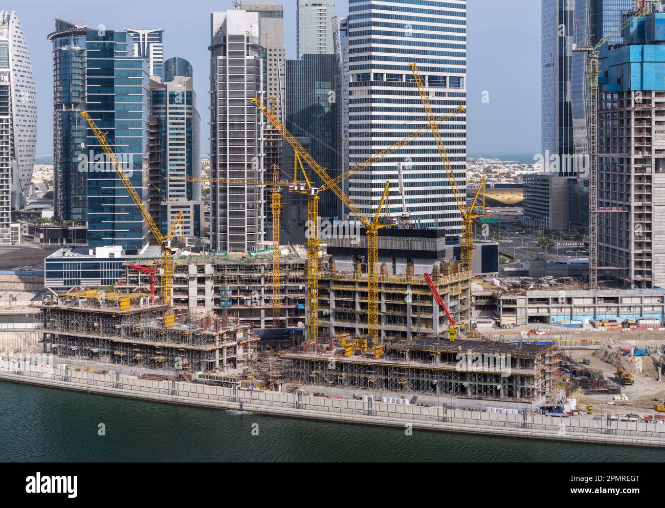 Cranes surround the construction of new tower for apartments along ...