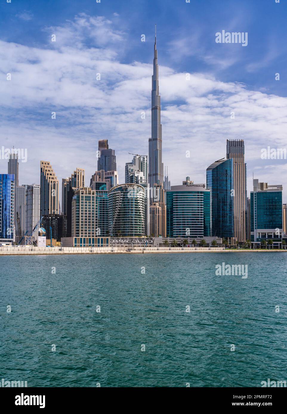 Dubai, UAE - April 2, 2023: Skyline of downtown district from water ...