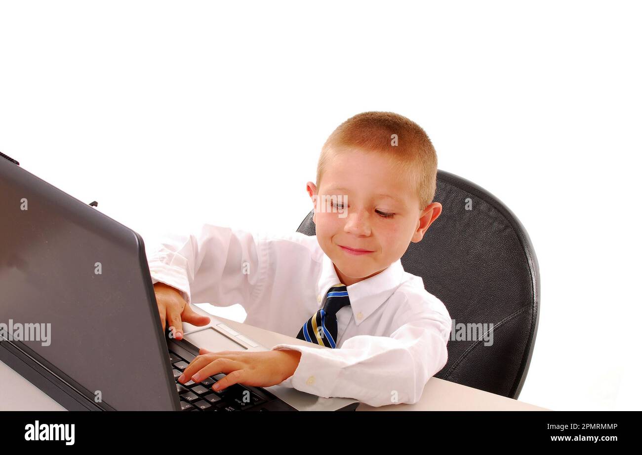 A Young boy businessman hard at work Stock Photo - Alamy