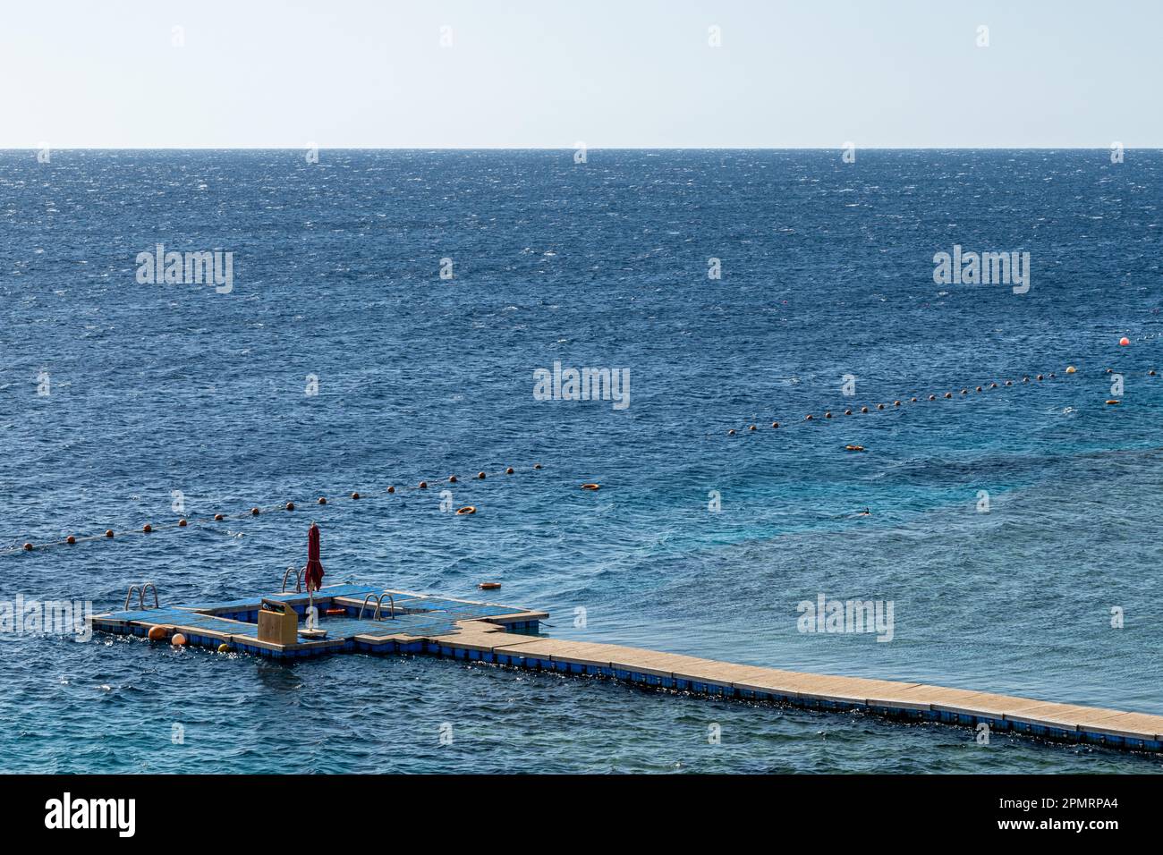 A view of a jetty with the Red Sea in the background at the Royal Savoy ...