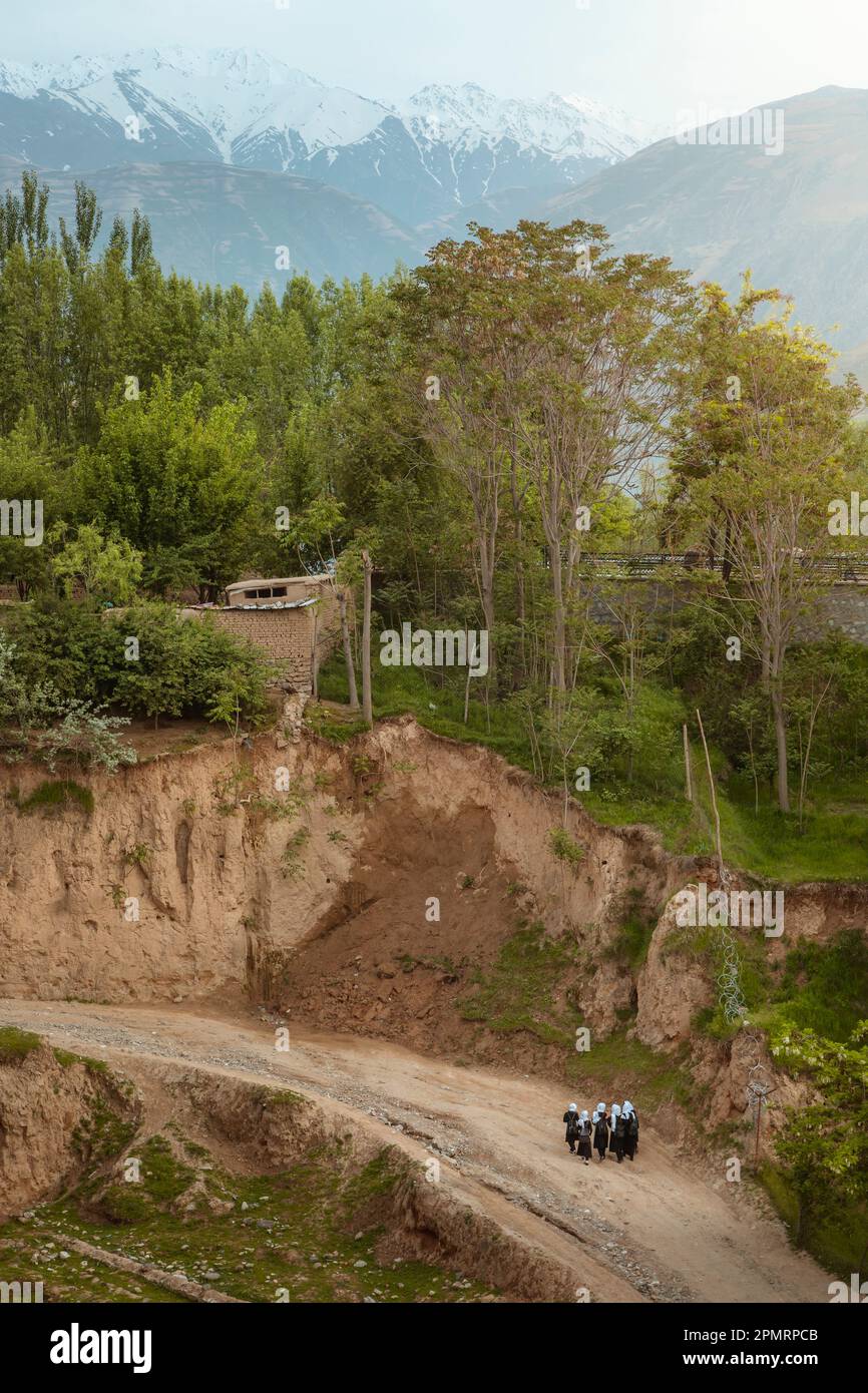 A beautiful photo of Afghan girls going to school in a village road ...