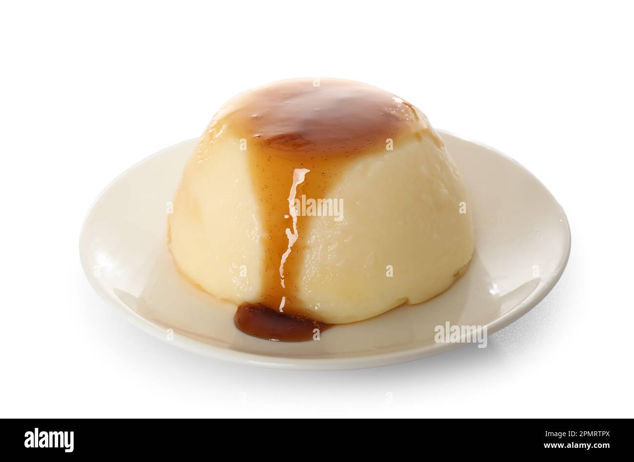 Plate with delicious pudding covered by caramel syrup isolated on white ...
