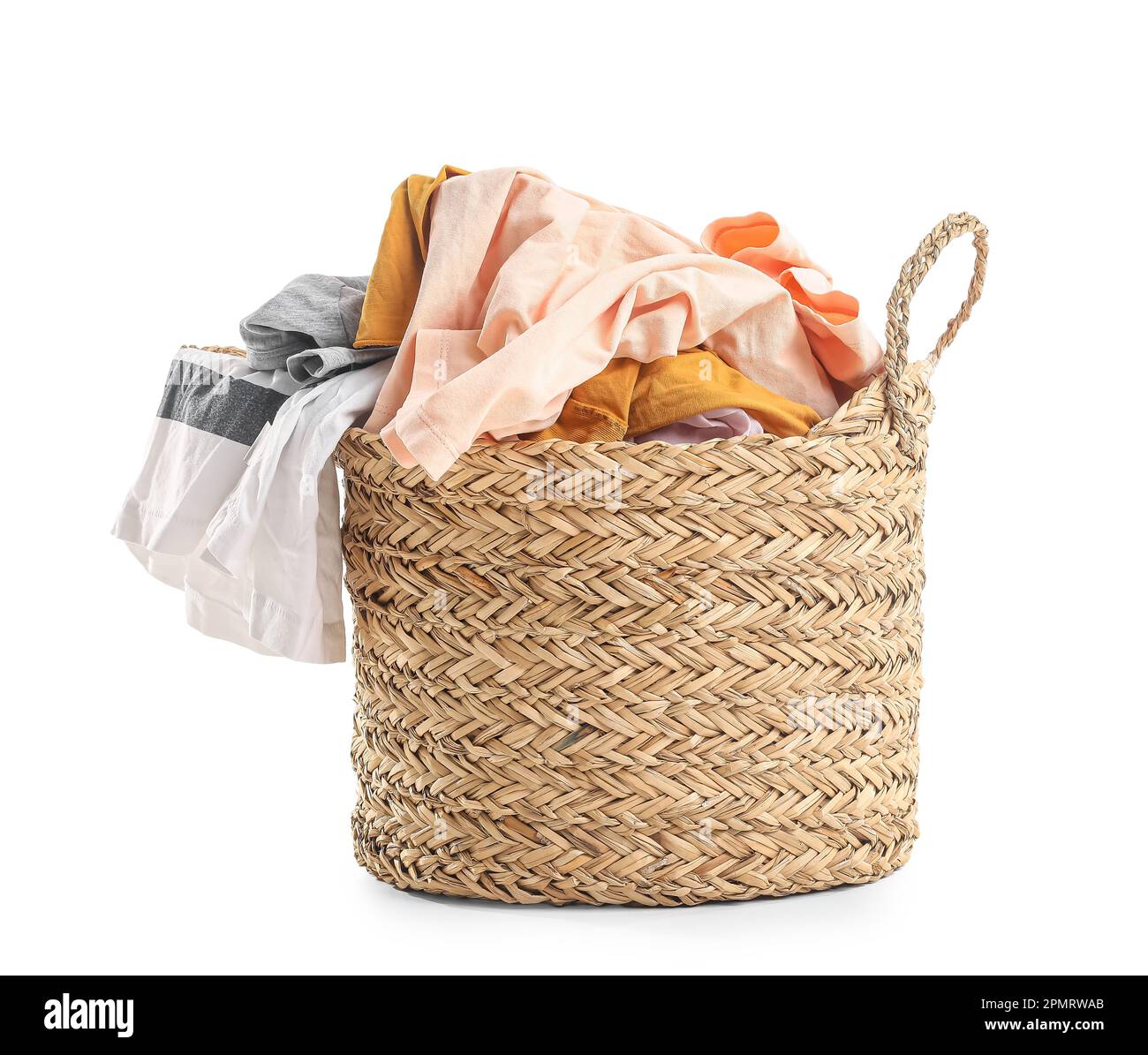 Wicker basket with dirty clothes on white background Stock Photo - Alamy