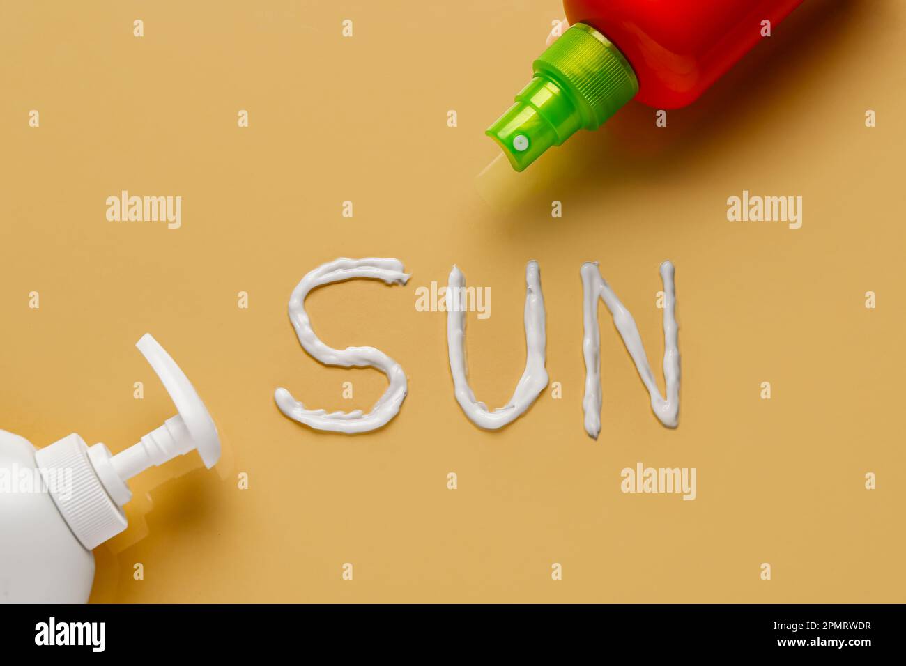 Word SUN made of sunscreen cream on yellow background Stock Photo - Alamy