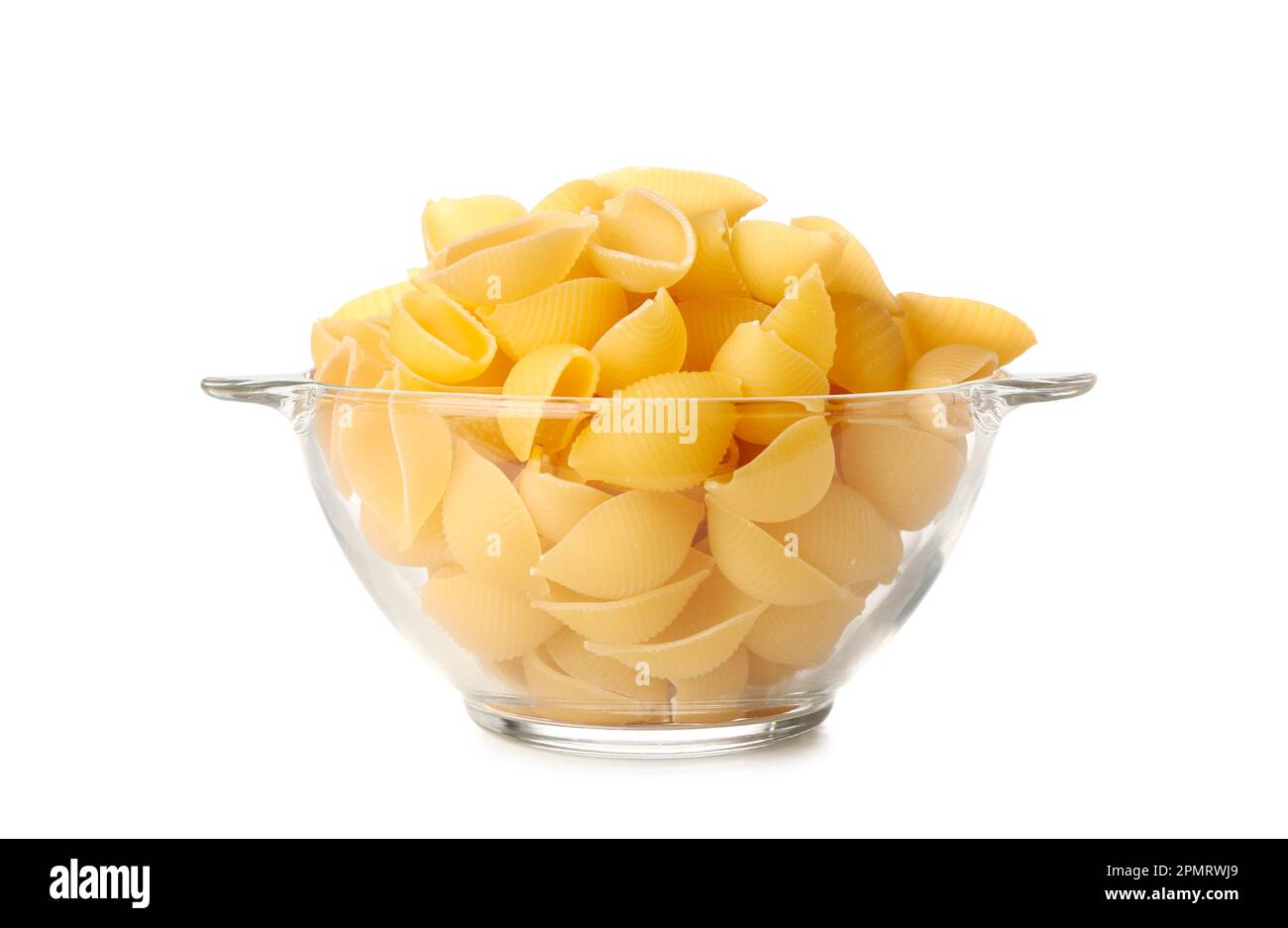 Bowl of raw conchiglie pasta isolated on white background Stock Photo ...
