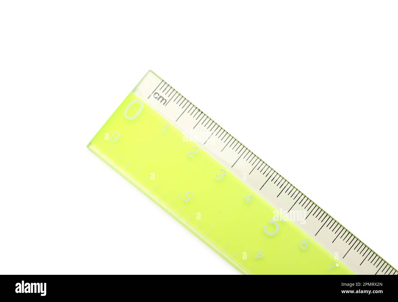 Yellow plastic ruler on white background Stock Photo - Alamy