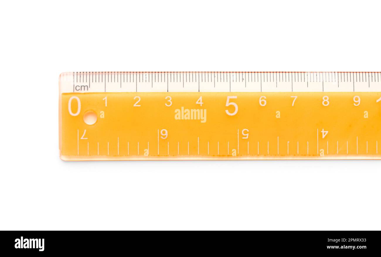Orange plastic ruler on white background Stock Photo - Alamy