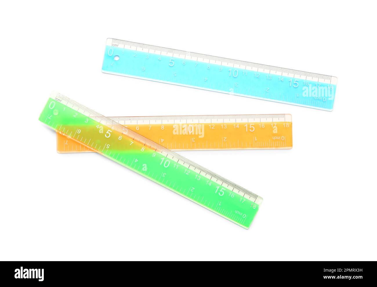 Colorful plastic rulers on white background Stock Photo - Alamy