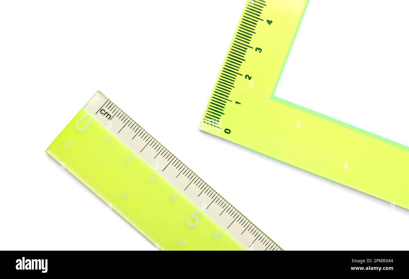 Yellow straight and triangle plastic ruler on white background Stock ...