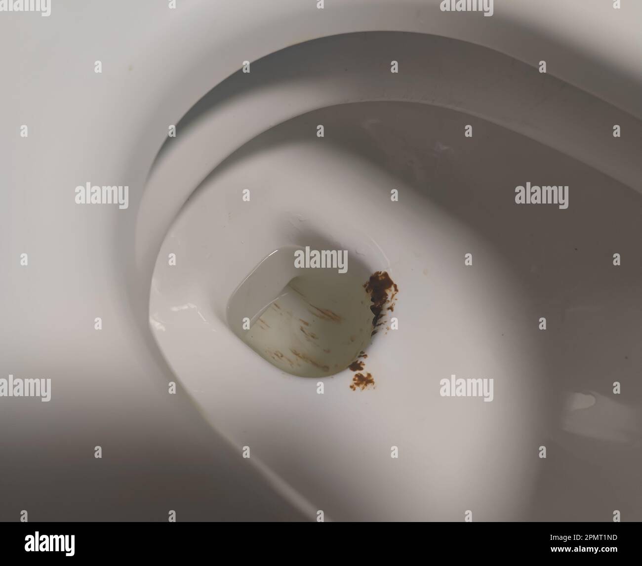 Dirty toilet bowl with unflushed water. Unhygienic, unclean and ...