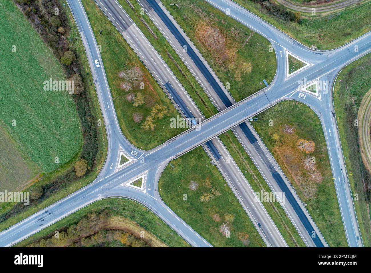 An aerial shot of a rural street intersection with no traffic ...