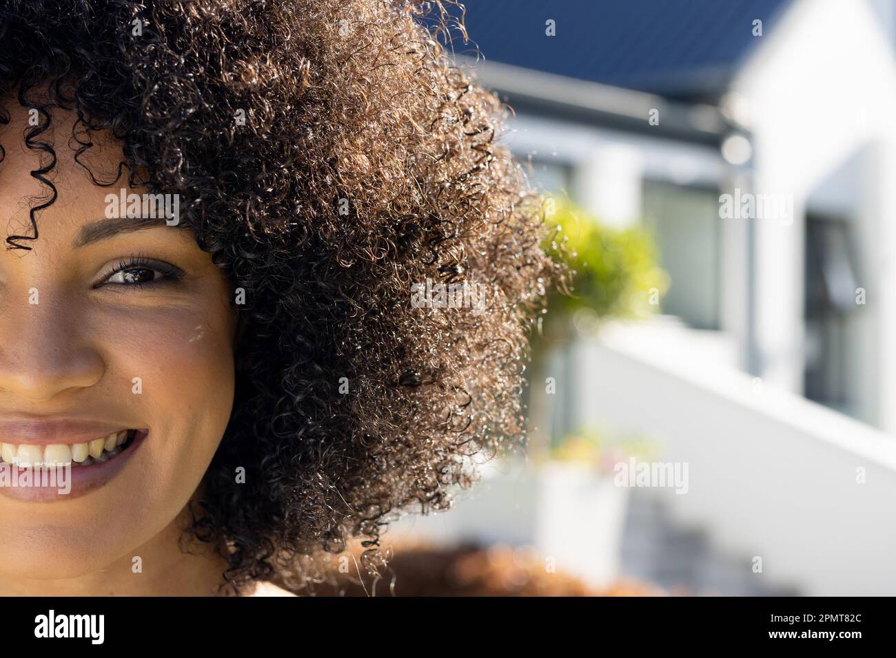 Half face happy biracial woman hi-res stock photography and images - Alamy