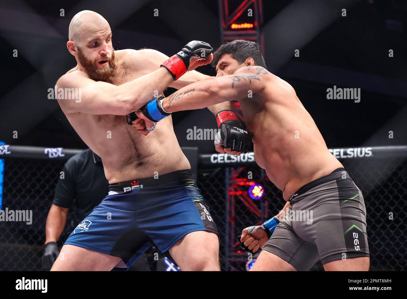 April 14, 2023: (R-L) Heavyweight Cezar Ferreira throws a punch at ...