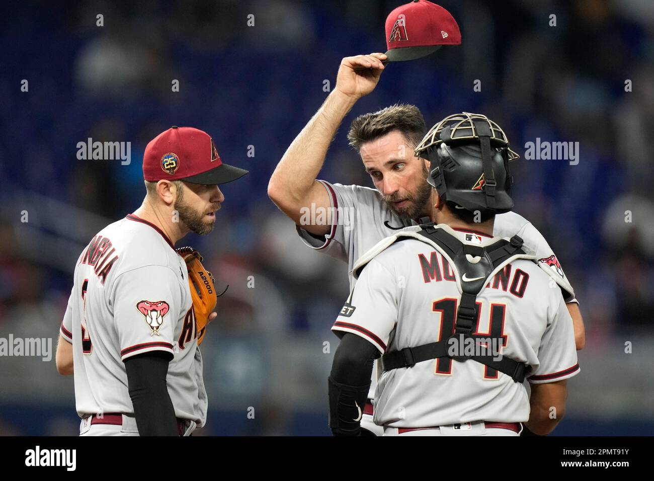 Arizona Diamondbacks starting pitcher Madison Bumgarner, center, stands ...