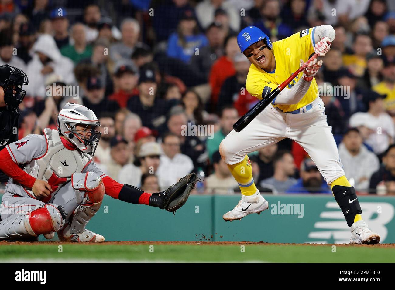 Boston Red Sox's Yu Chang is hit by a pitch in front of Los Angeles ...