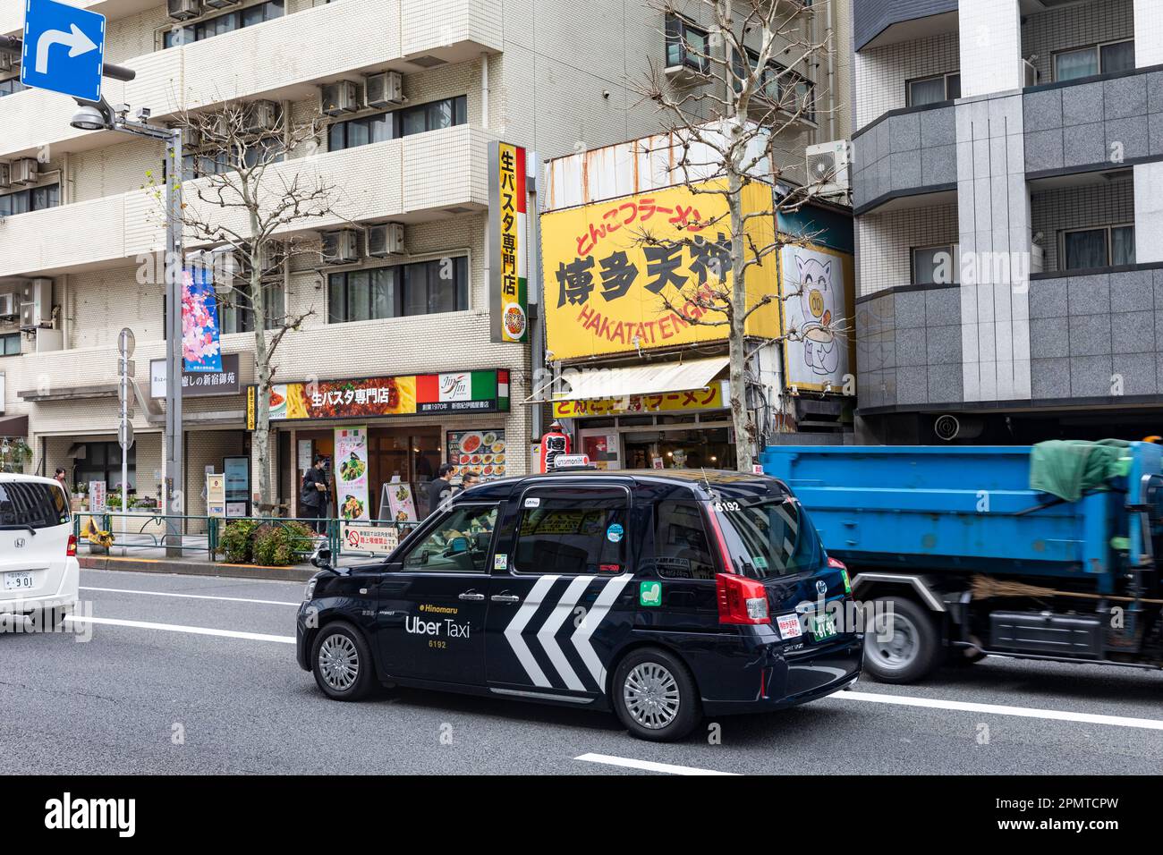 Shinjuku Tokyo April 2023, Toyota JPN black hybrid electric taxi cab ...