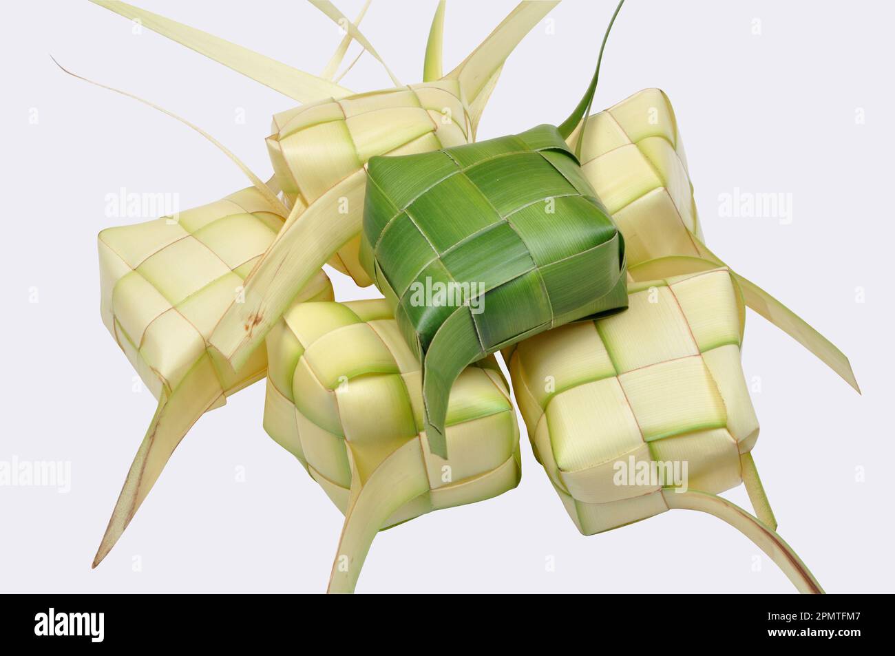 Ketupat is a traditional food from Indonesia made of rice wrapped in ...